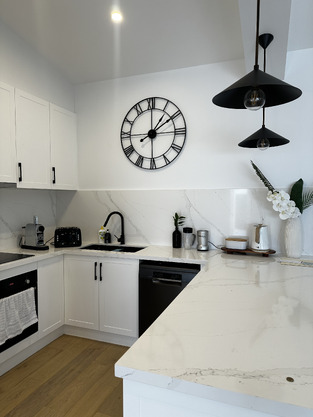 Toki Black Carl Wall Clock | Temple & Webster